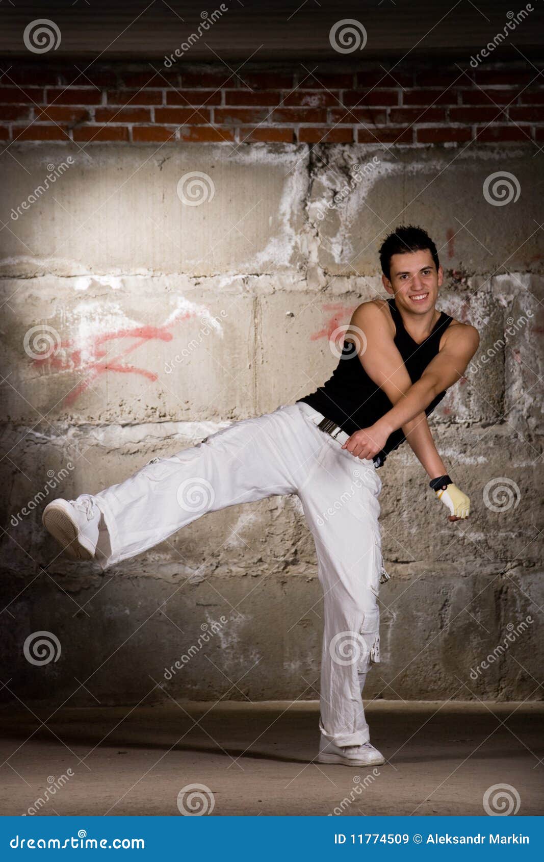 Hip Hop Boy Dancing in Modern Style Over Grey Wall Stock Image - Image ...