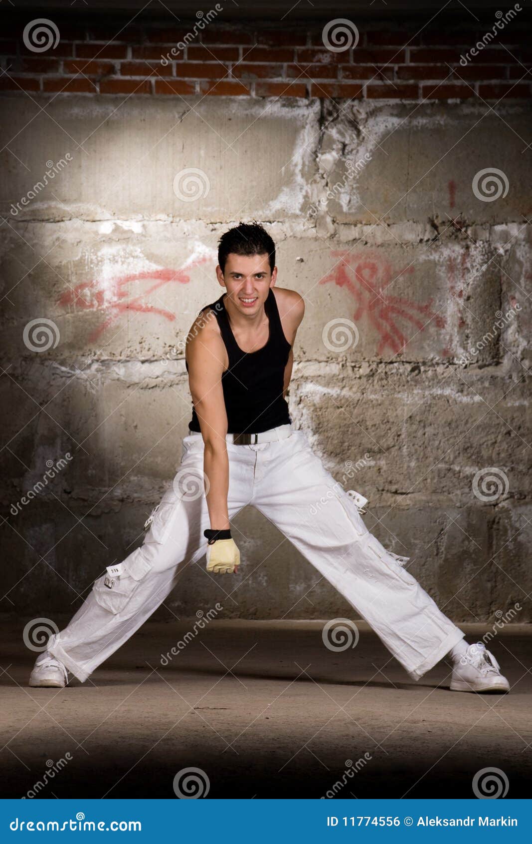 Hip Hop Boy Dancing in Modern Style Over Grey Wall Stock Photo - Image ...