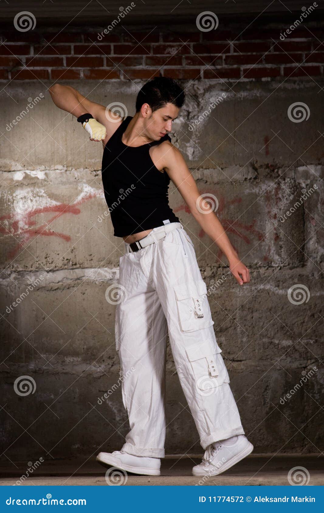 Hip Hop Boy Dancing in Modern Style Over Grey Wall Stock Photo - Image ...