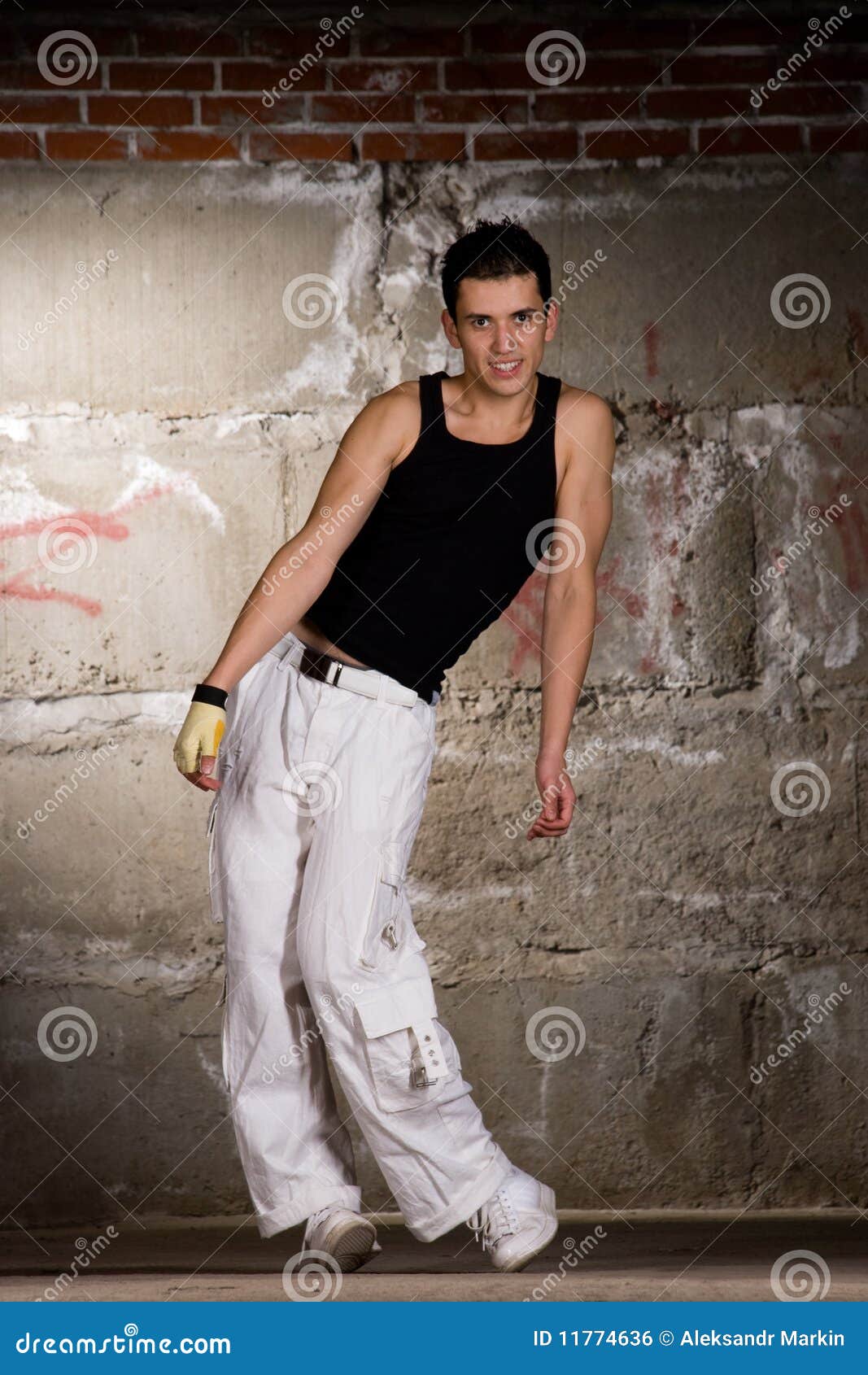 Hip Hop Boy Dancing in Modern Style Over Grey Wall Stock Photo - Image ...