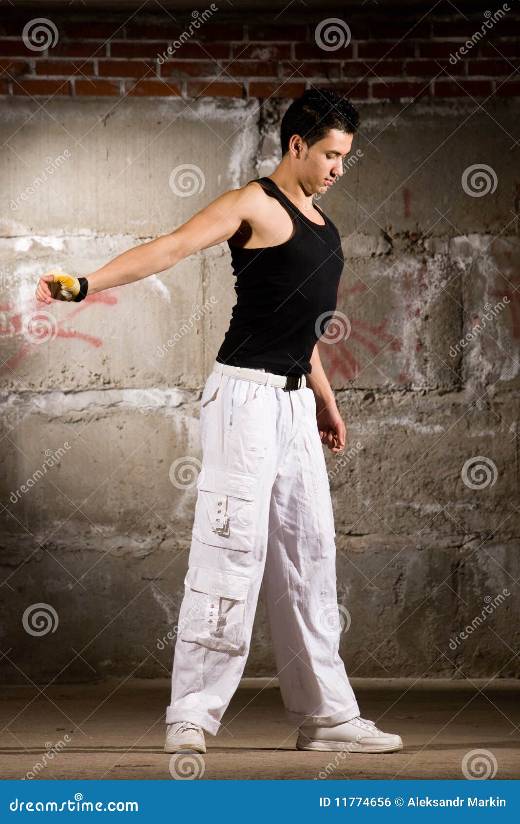 Hip Hop Boy Dancing in Modern Style Over Grey Wall Stock Photo - Image ...