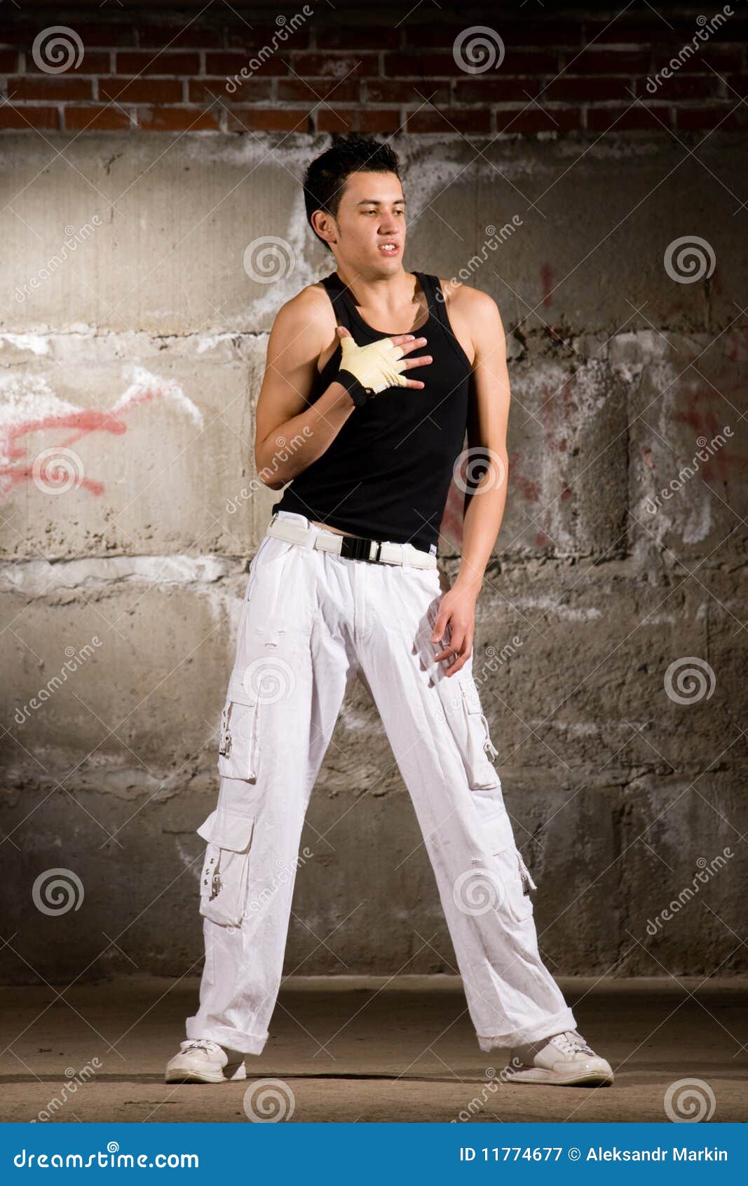Hip Hop Boy Dancing in Modern Style Over Grey Wall Stock Image - Image ...