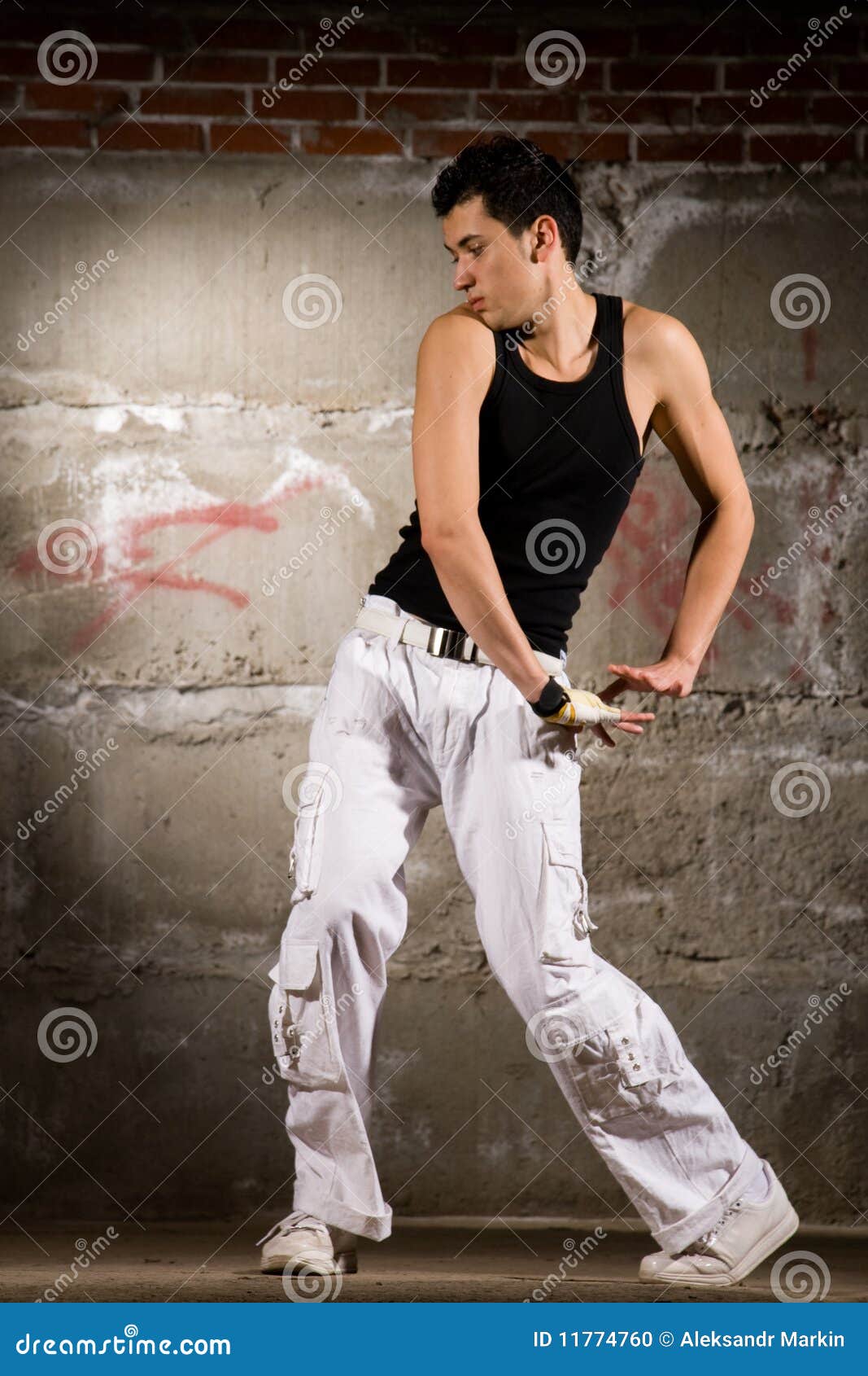 Hip Hop Boy Dancing in Modern Style Over Grey Wall Stock Photo - Image ...