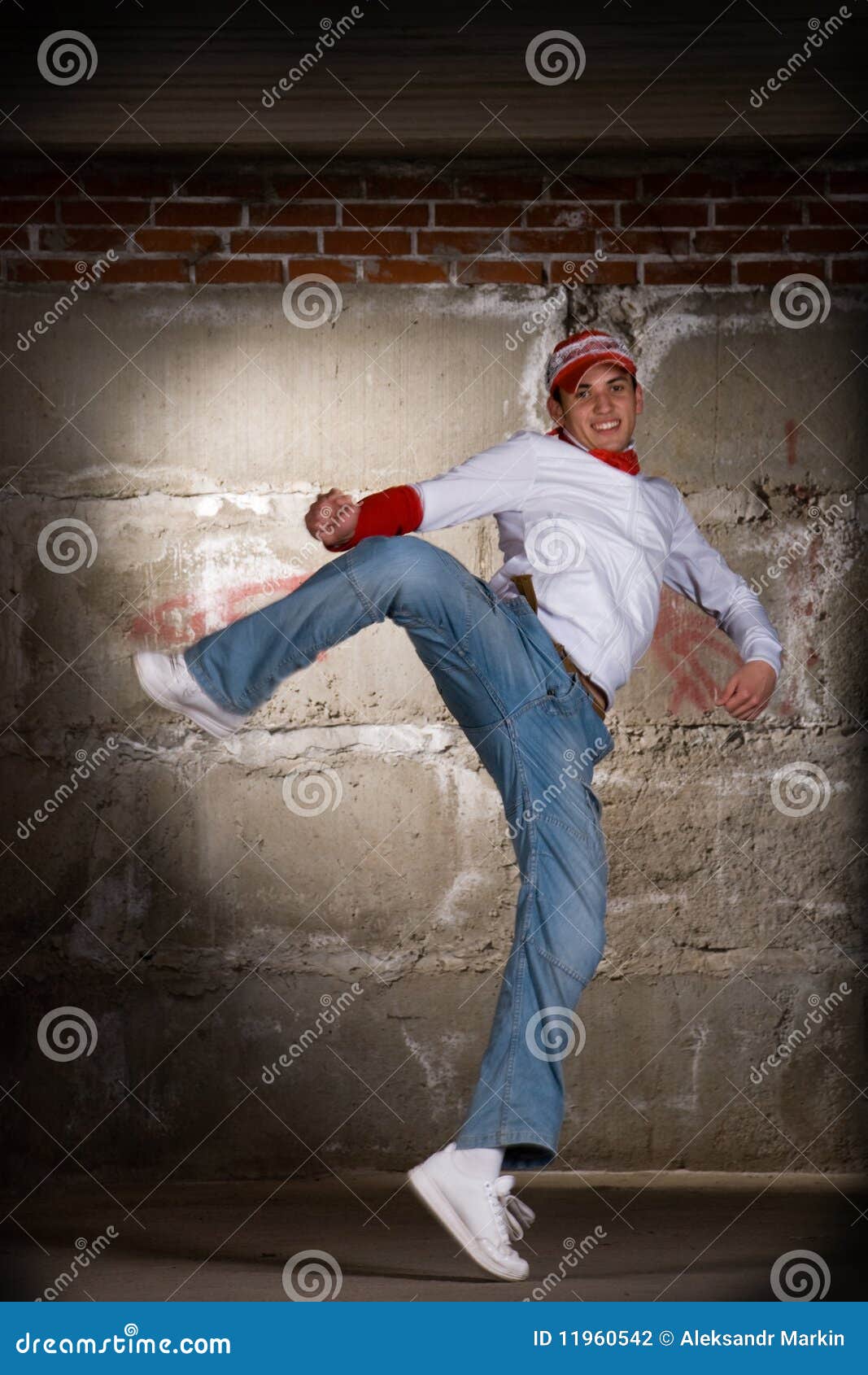 Hip Hop Boy Dancing in Modern Style Over Grey Wall Stock Photo - Image ...