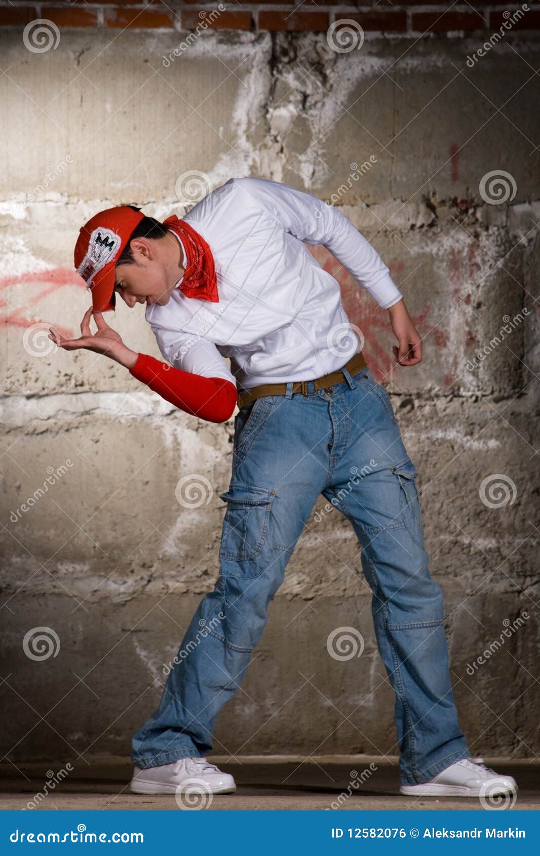 Hip Hop Boy Dancing in Modern Style Over Grey Wall Stock Photo - Image ...