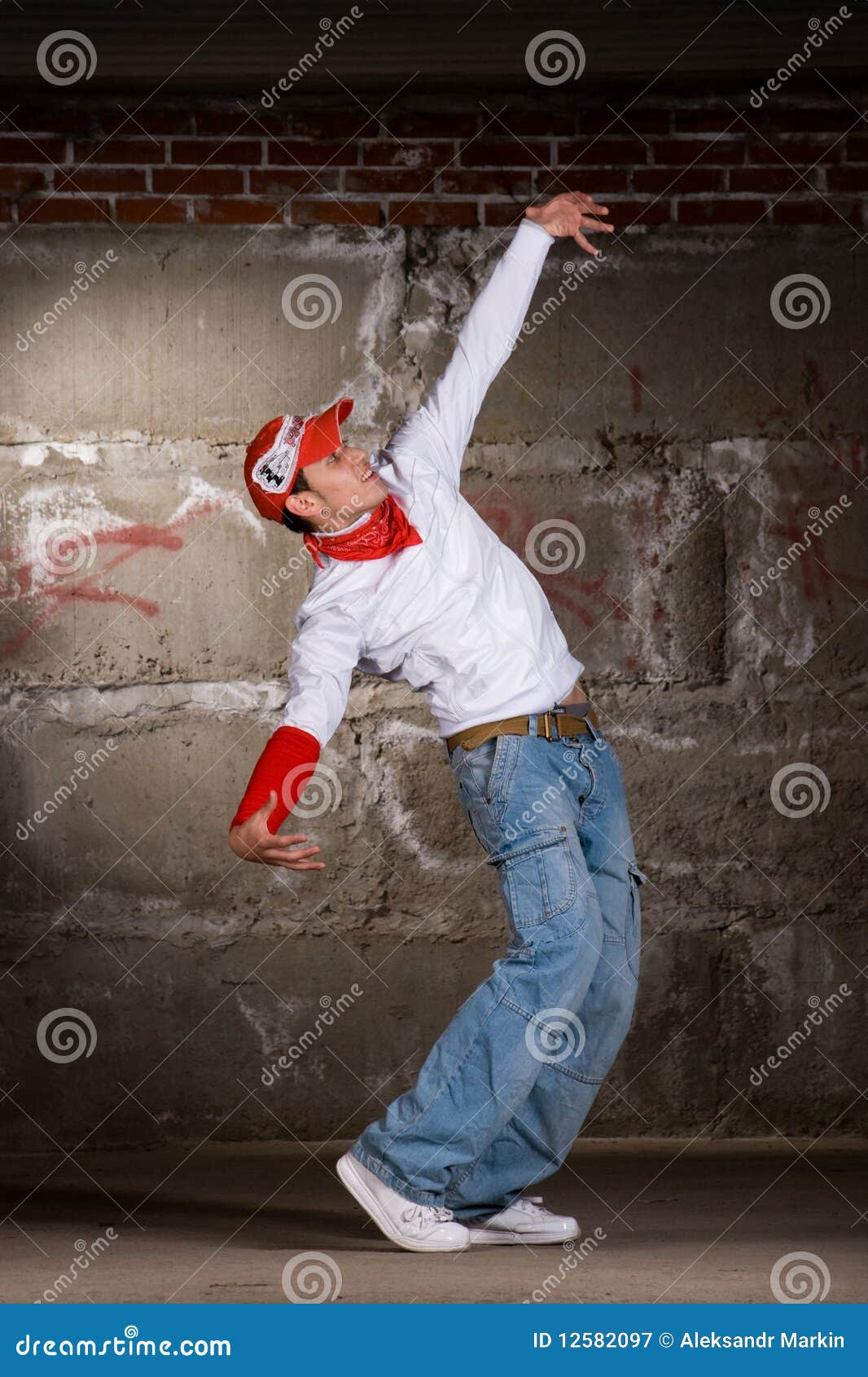 Hip Hop Boy Dancing in Modern Style Over Grey Wall Stock Image - Image ...
