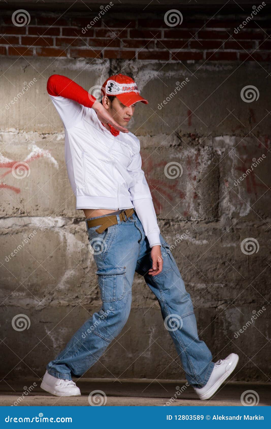 Hip Hop Boy Dancing in Modern Style Over Grey Wall Stock Image - Image ...