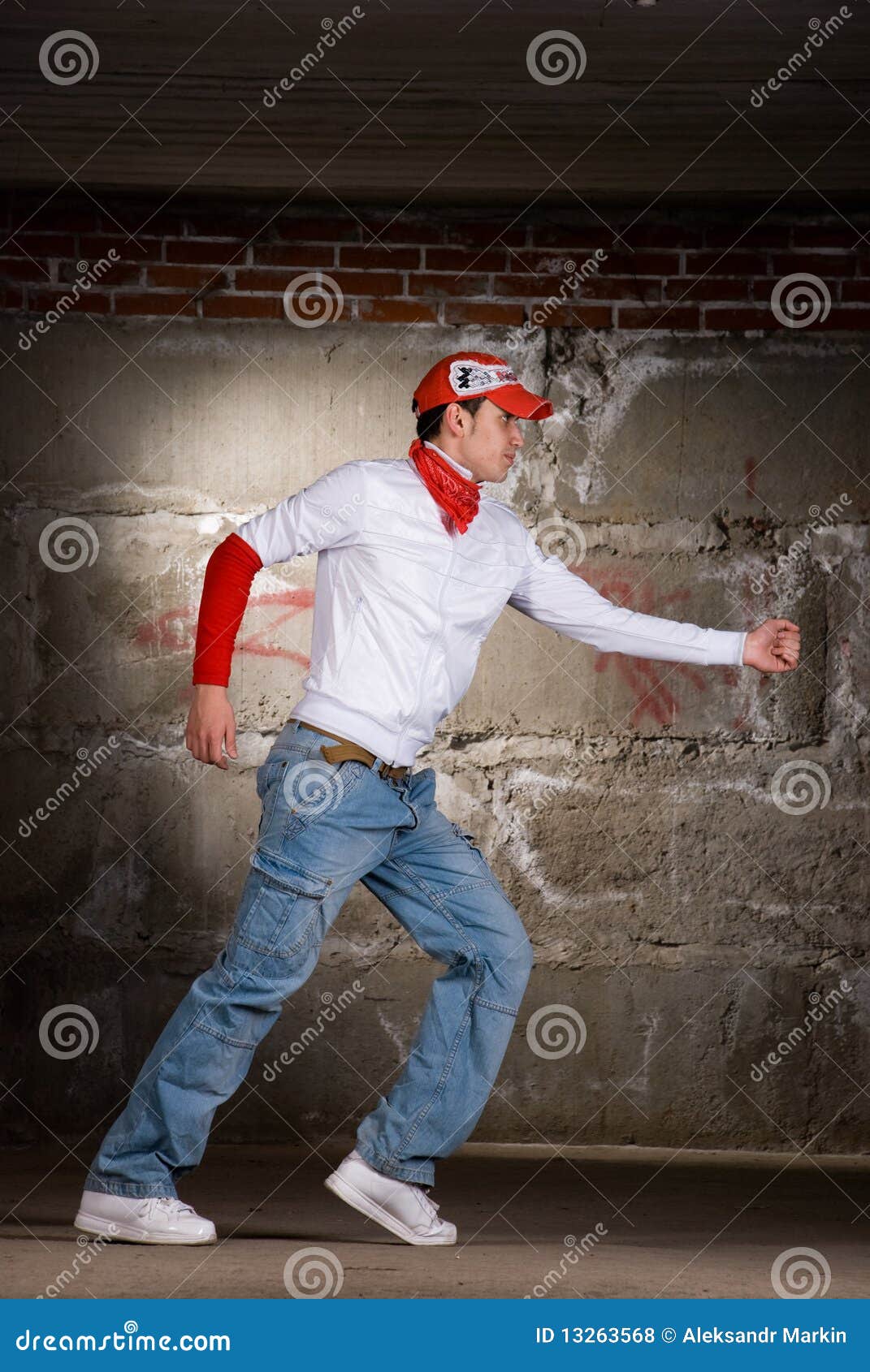 Hip Hop Boy Dancing in Modern Style Over Grey Wall Stock Photo - Image ...
