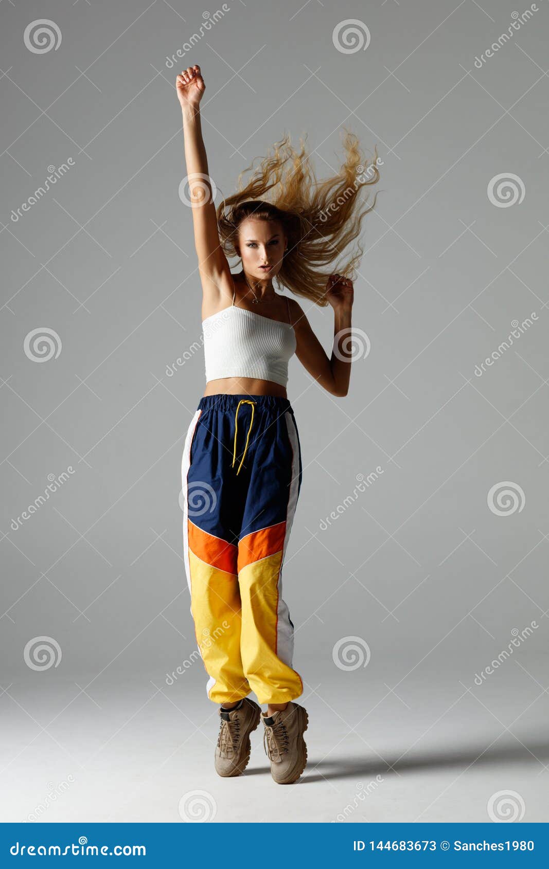 Hip Hop Dancer Moving and Jumping in Studio Stock Image - Image of ...