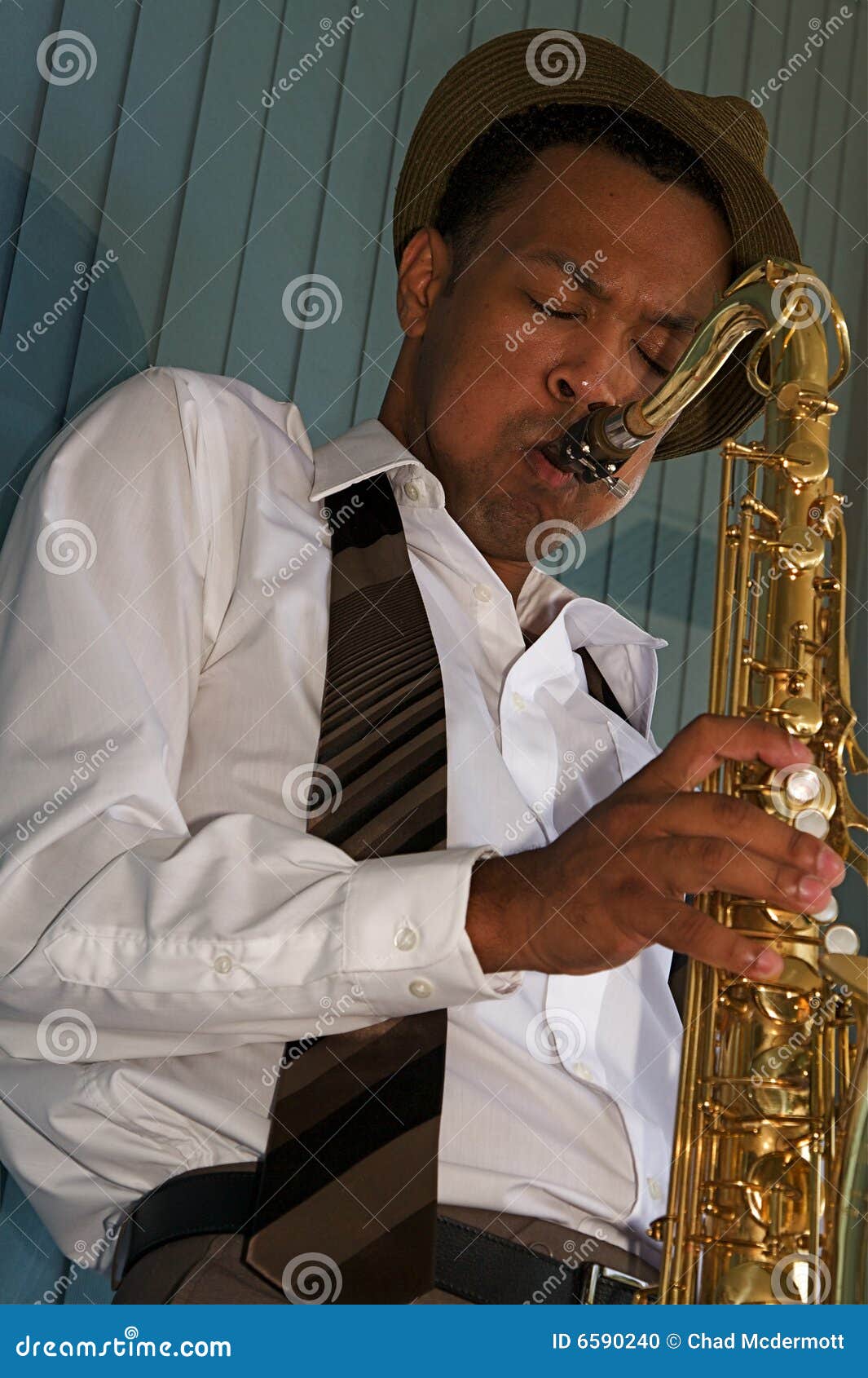 Hip Young Saxophonist stock photo. Image of playing, music - 6590240