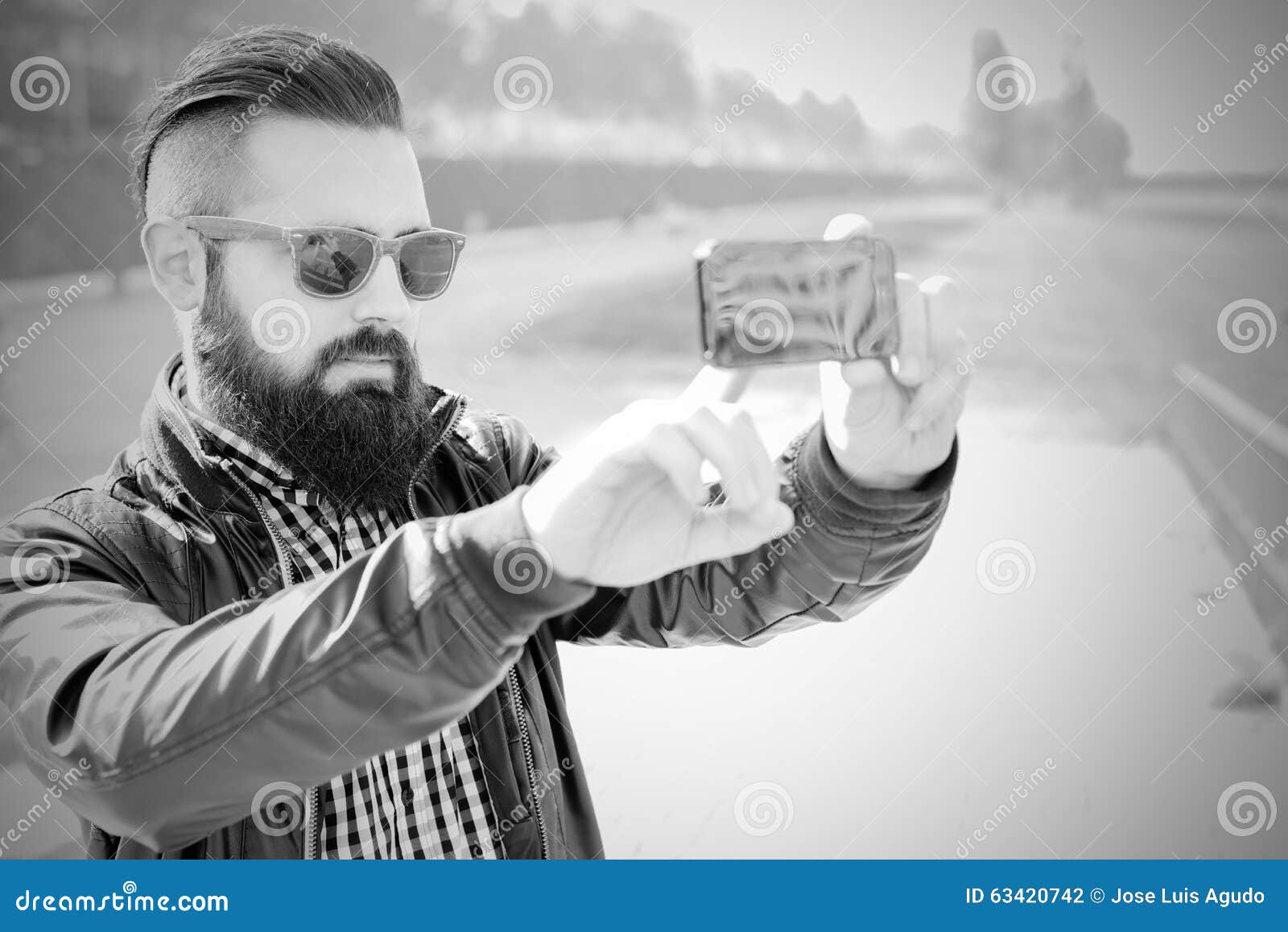 Hipster Attractive Modern Man Makes a Selfie.. WB Stock Photo - Image ...