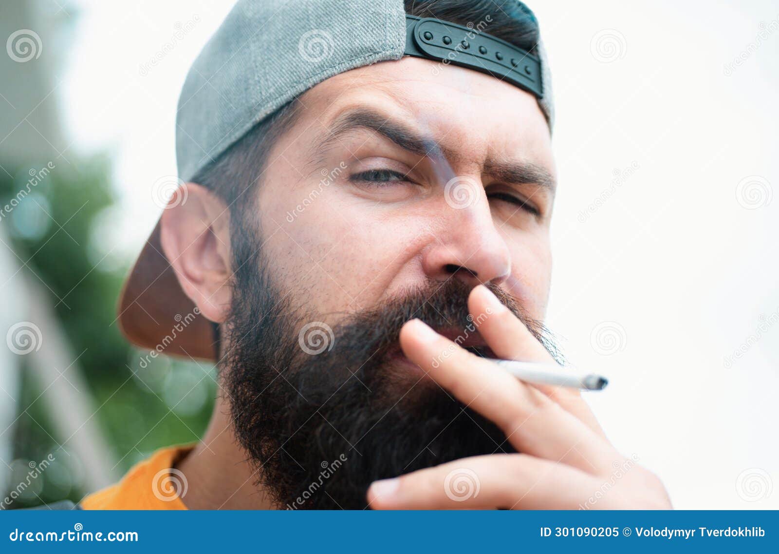 Hipster Brutal Man Smoking Cigarette. Smoking Addiction. Stock Image ...