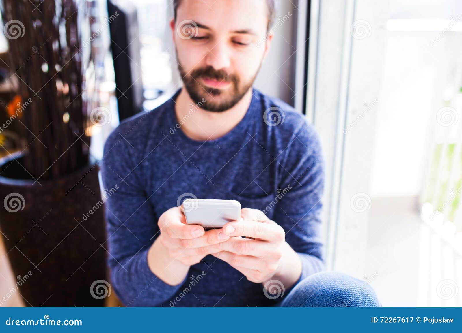Hipster Businessman Working From Home Holding Smartphone Texti Stock
