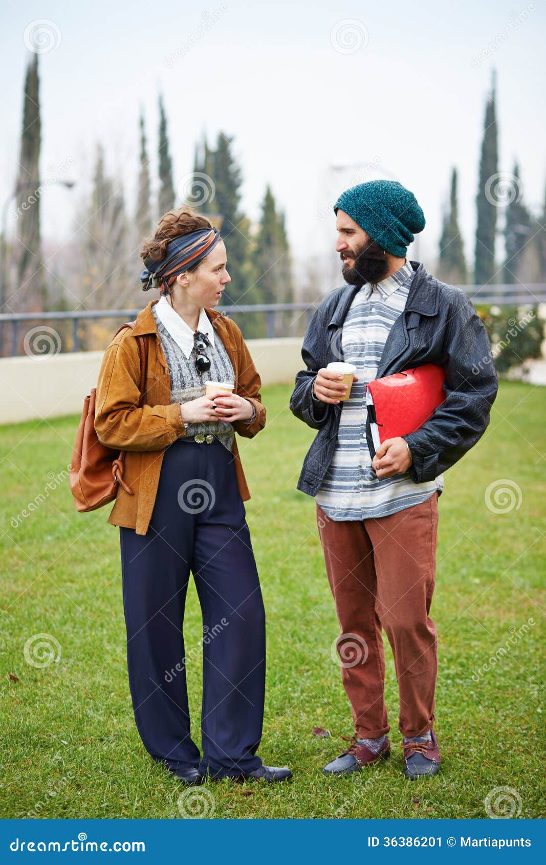 Hipster Couple Talking and Drinking Coffee To Go Stock Image - Image of ...