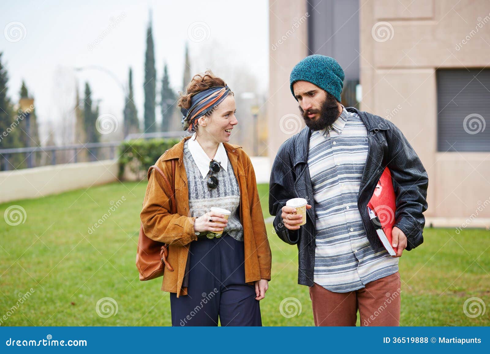 Hipster Couple Talking and Drinking Coffee To Go Stock Photo - Image of ...