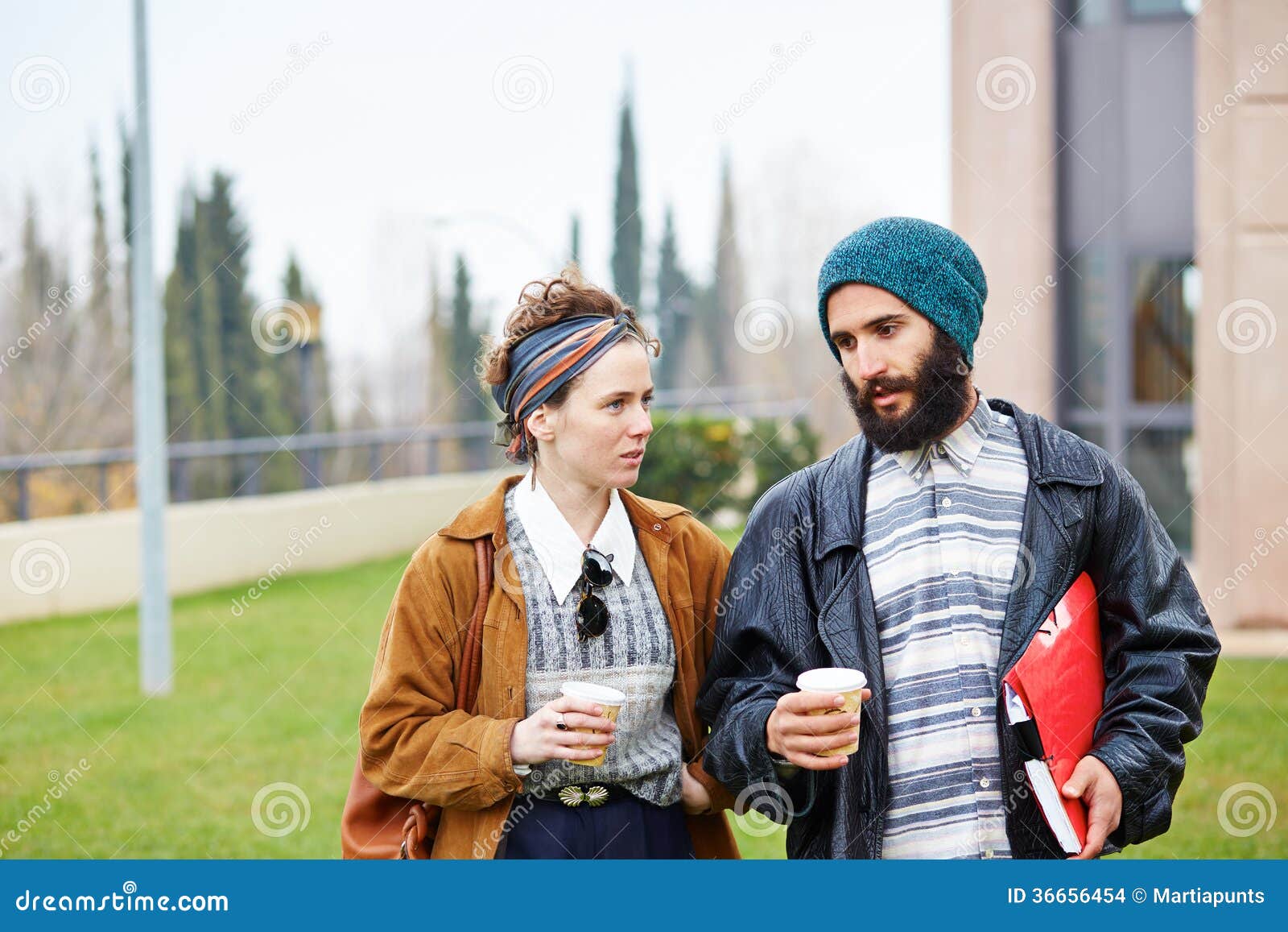 Hipster Couple Talking and Drinking Coffee To Go Stock Photo - Image of ...