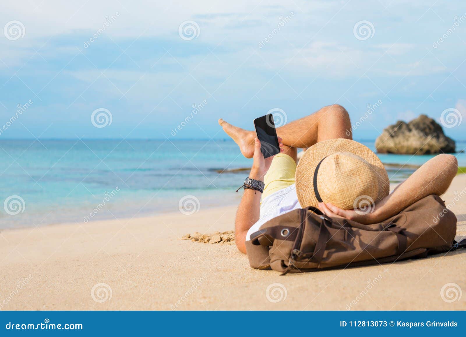 Guy with Smartphone Lying on the Beach Stock Image - Image of hipster ...
