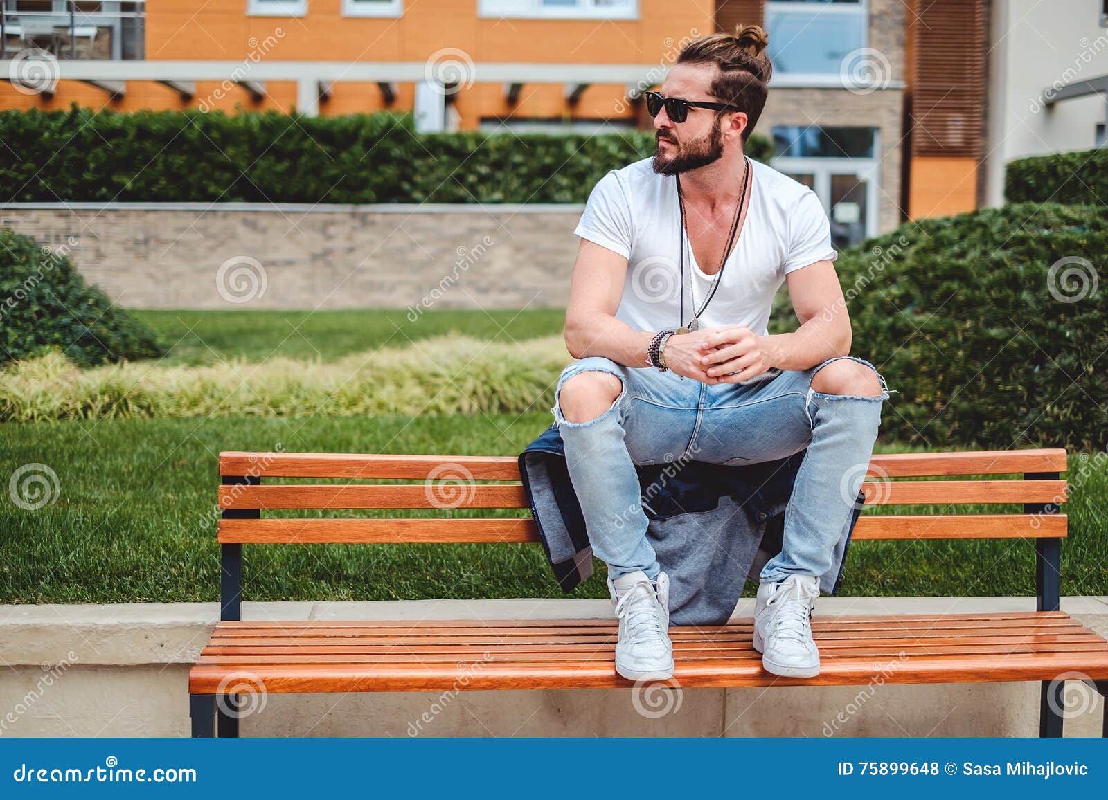 Hipster with Man Bun Sitting on the Park Bench Stock Photo - Image of ...