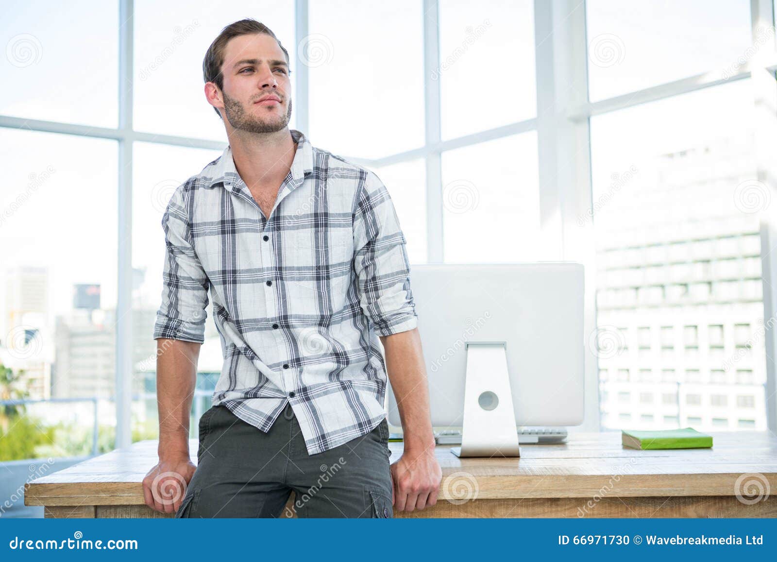 Hipster Man Sitting on Desk Stock Photo - Image of agency, professional ...