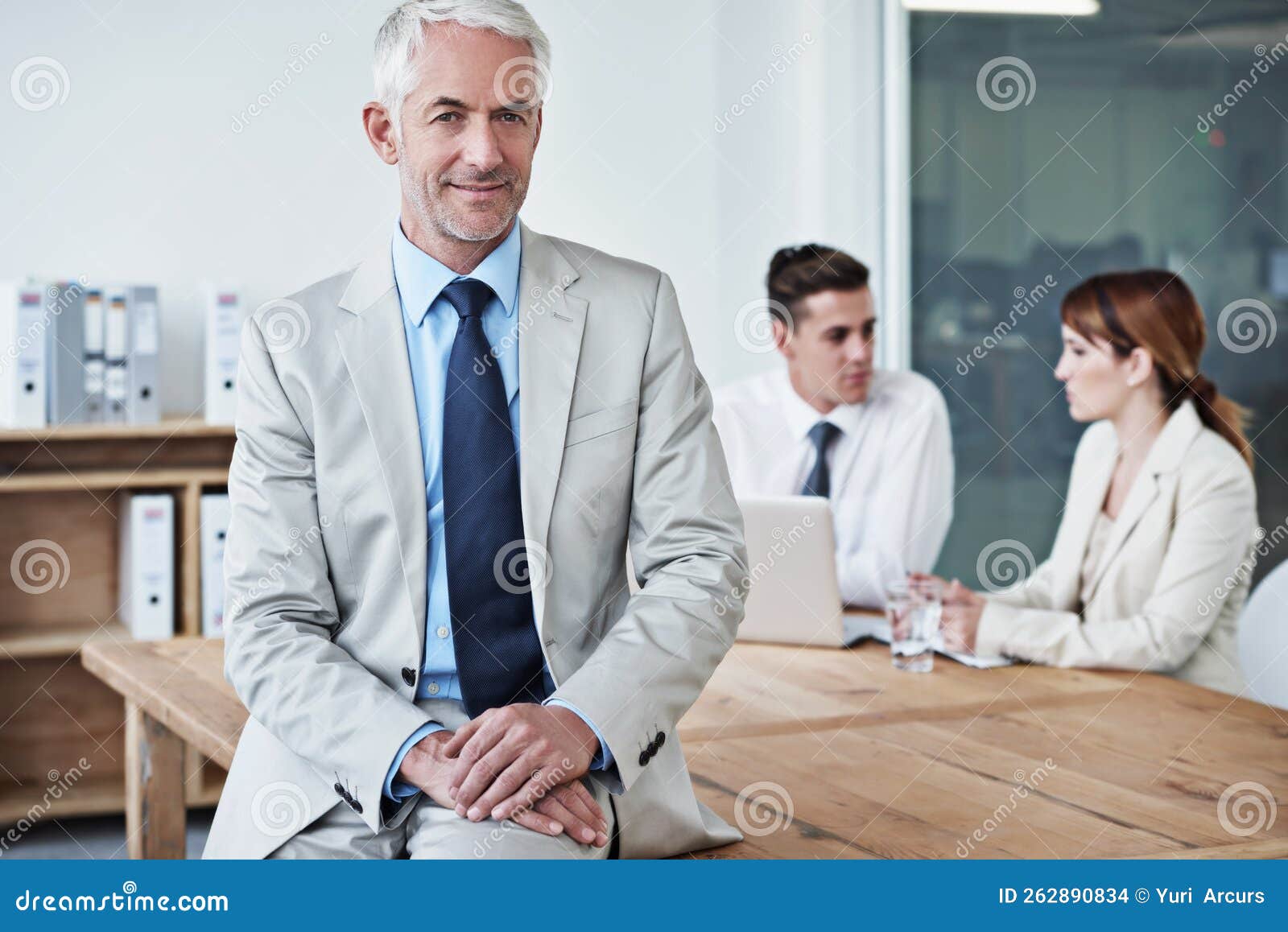 His Years of Experience Will Guide the Team. a Group of Colleagues ...