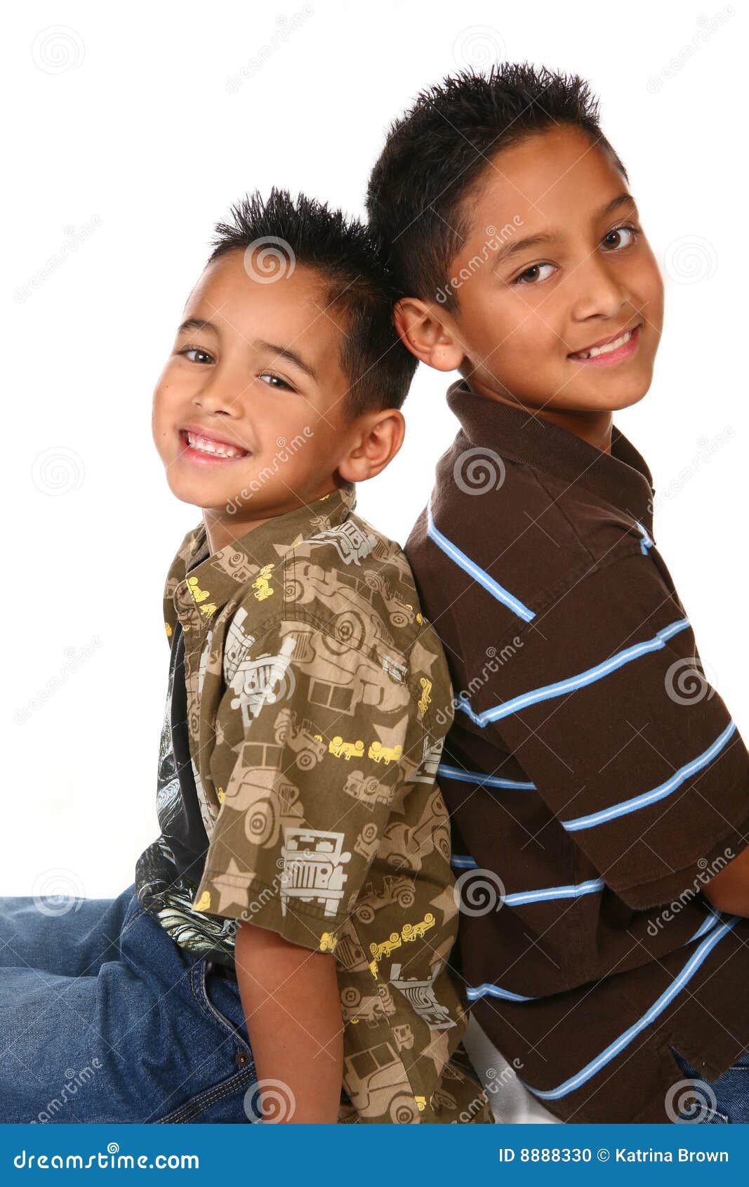 Hispanic American Brothers Sitting and Smiling Stock Photo - Image of ...
