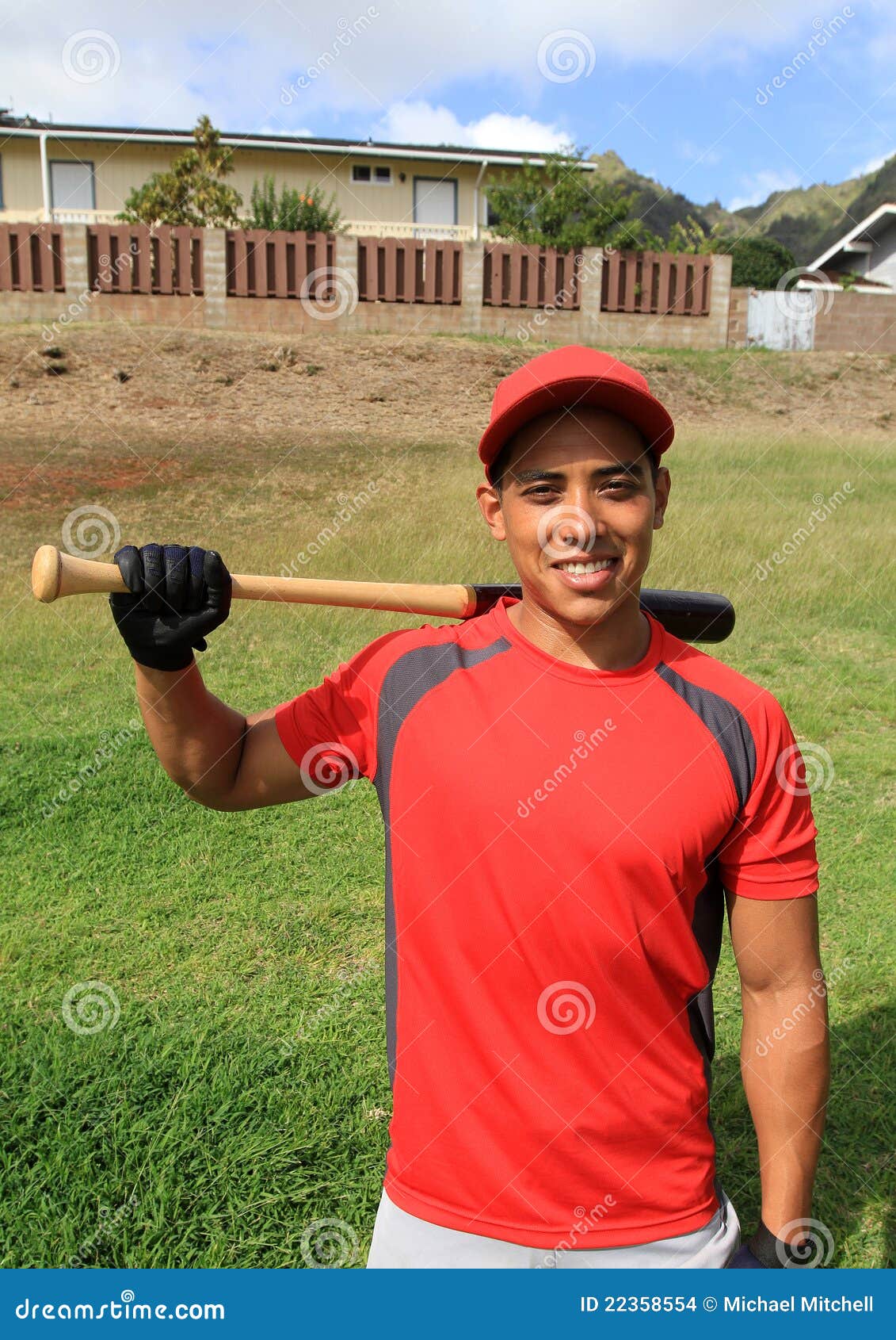 Hispanic Baseball Player in the Field Smiling Stock Photo - Image of ...