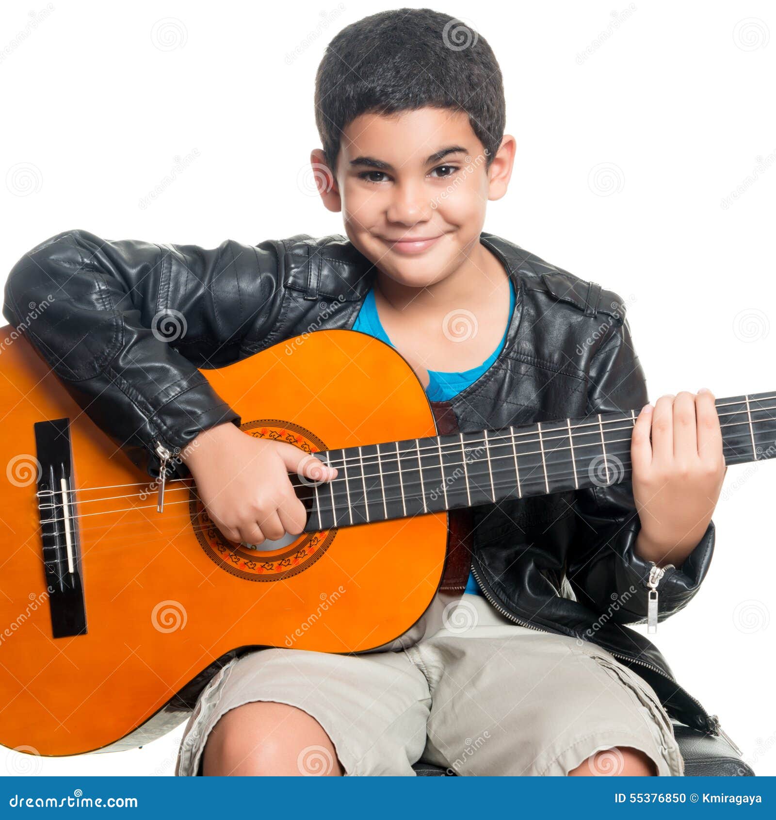 Hispanic Boy Playing an Acoustic Guitar Stock Photo - Image of latino ...