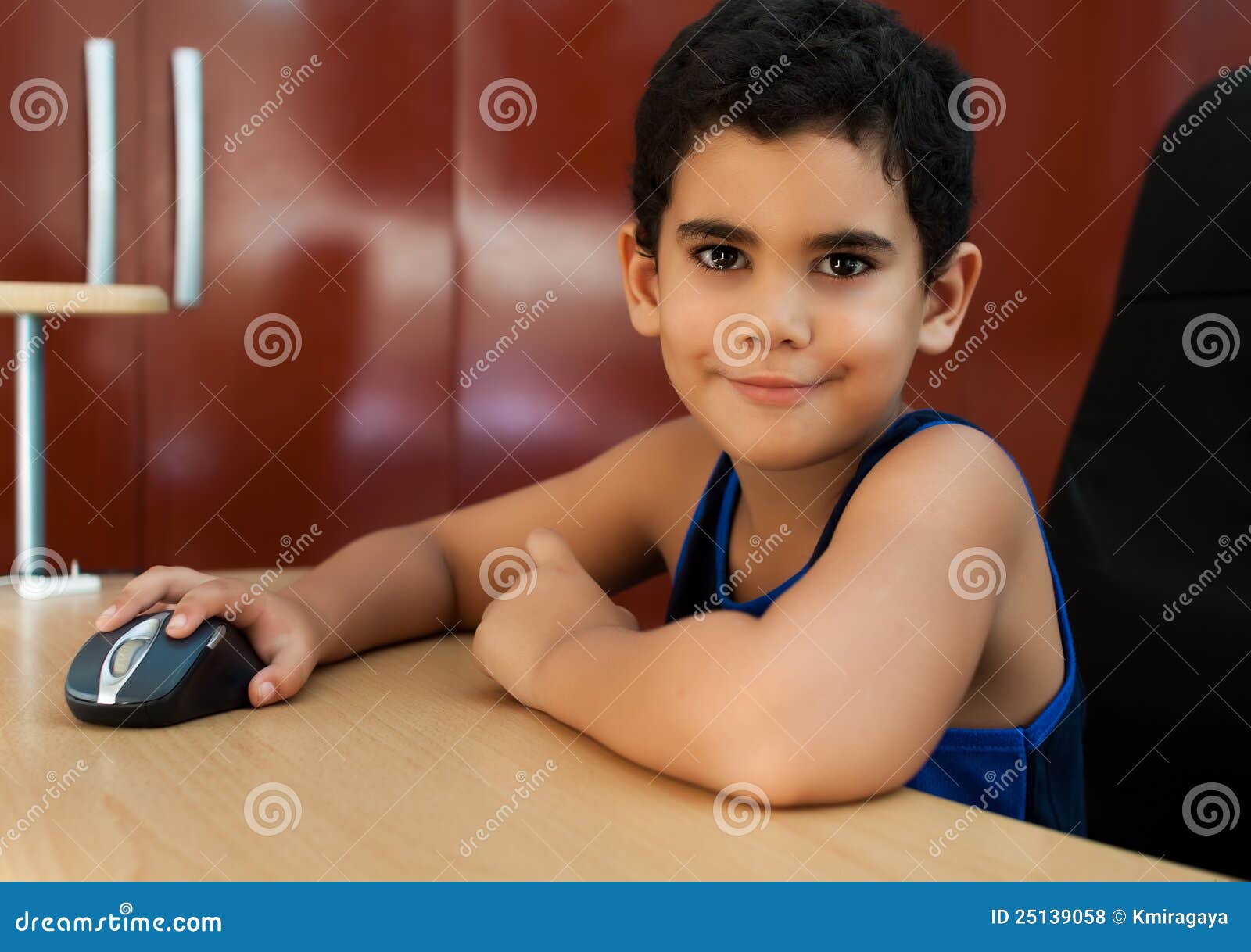 Hispanic Boy Working on a Computer at Home Stock Photo - Image of game ...