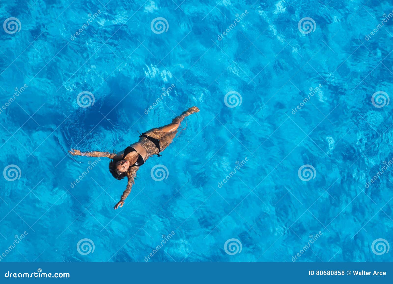 SPA Model In Pool With Citrus. Beautiful Girl In Bikini Floating With ...