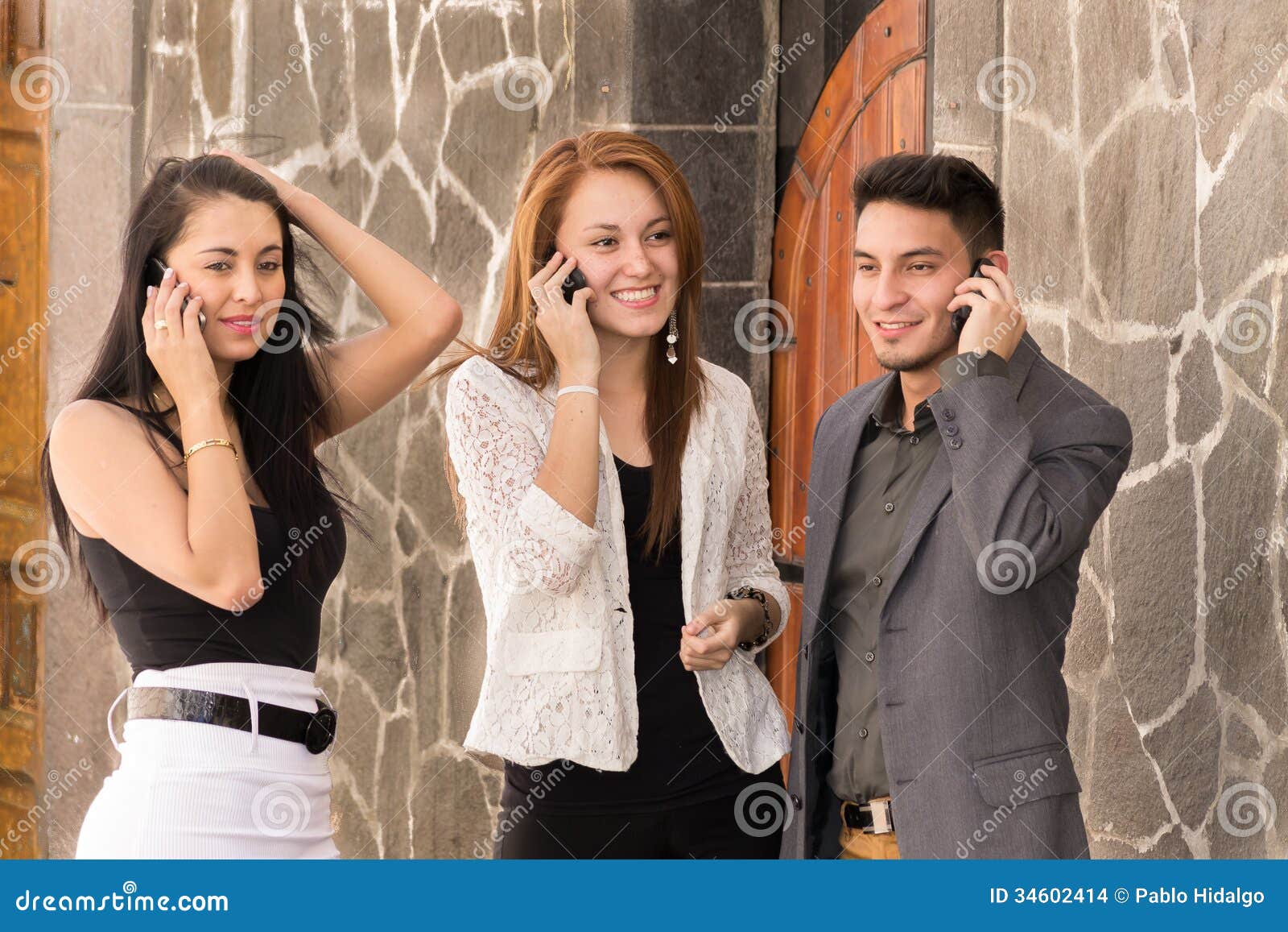 Hispanic Business People Talking on Phone Outside Stock Photo - Image ...