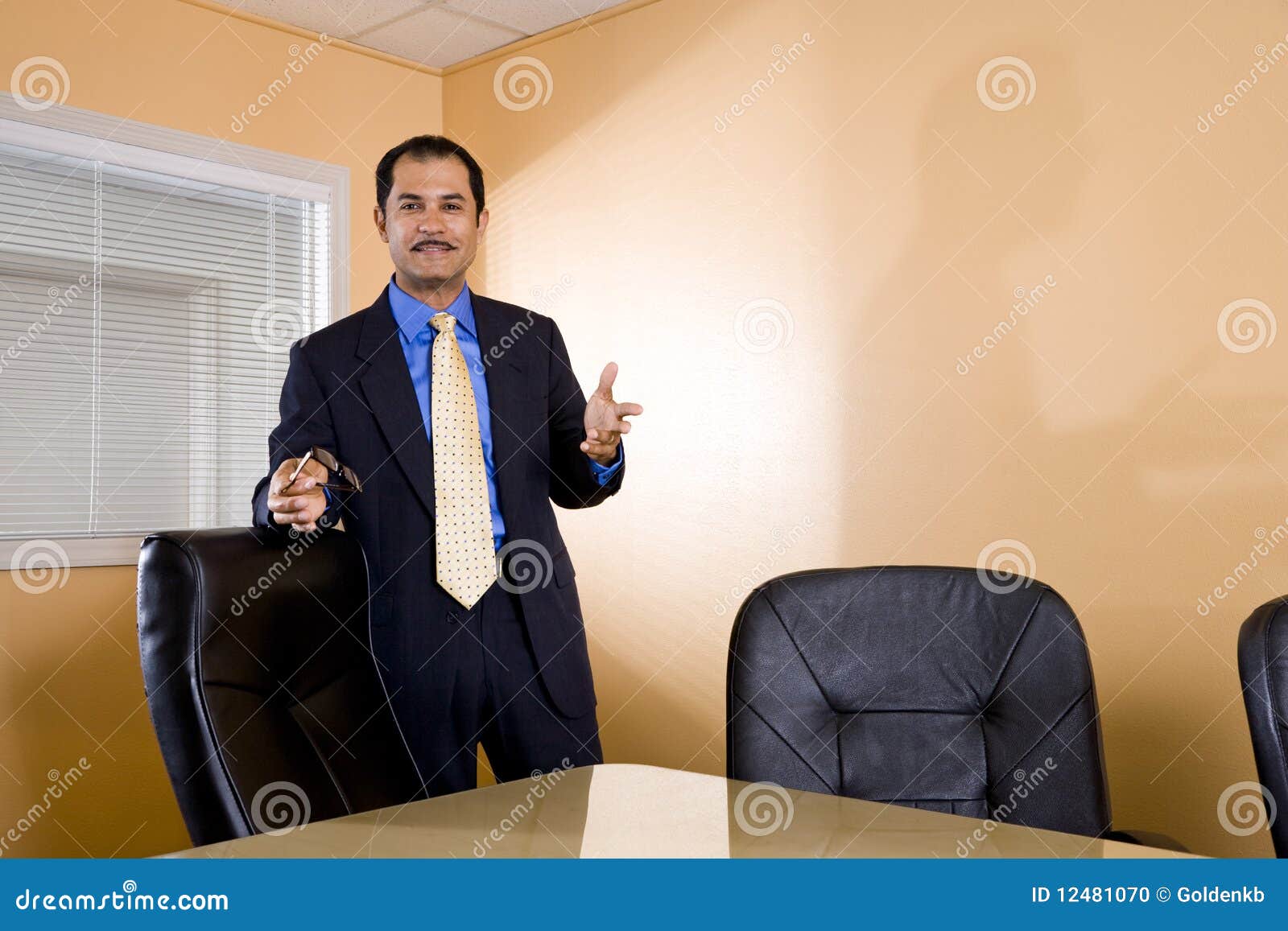 Hispanic Businessman Making a Point Stock Photo - Image of worker ...