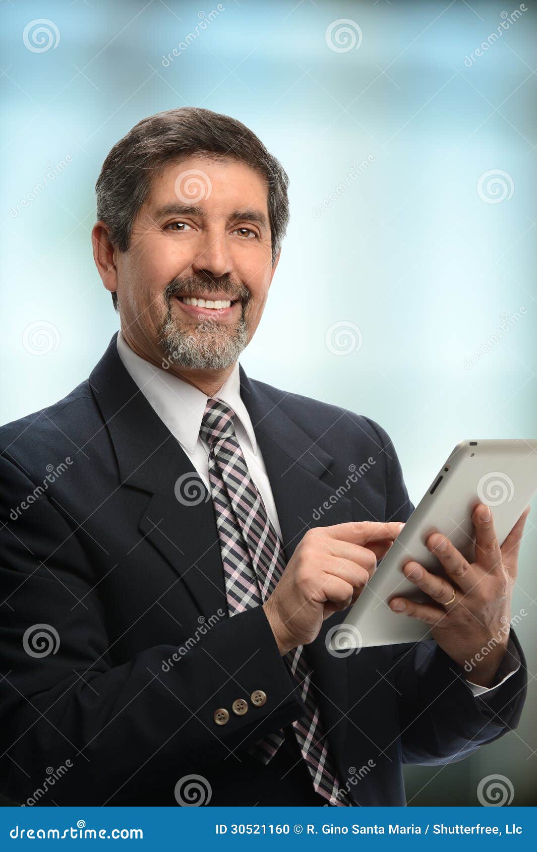Hispanic Businessman Using Electronic Tablet Stock Photo - Image of ...