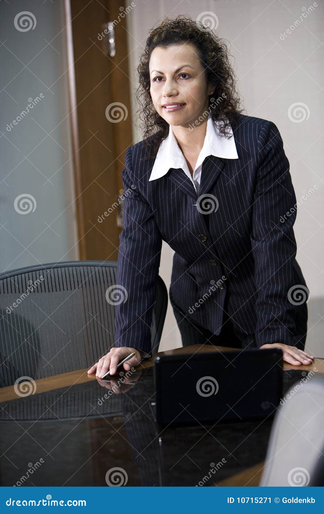 Hispanic businesswoman stock image. Image of focused - 10715271