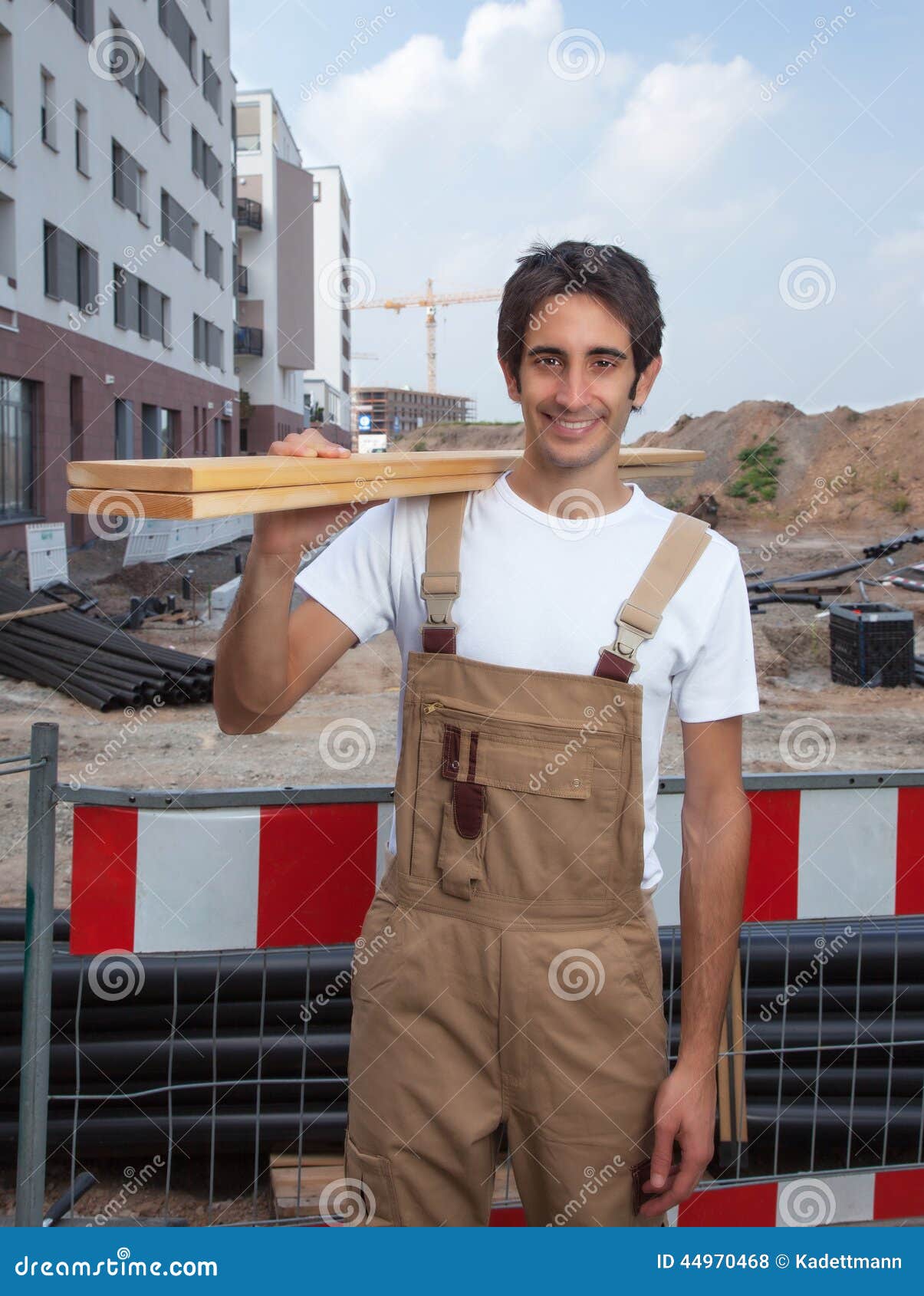 Hispanic Carpenter on Construction Site Stock Photo - Image of board ...