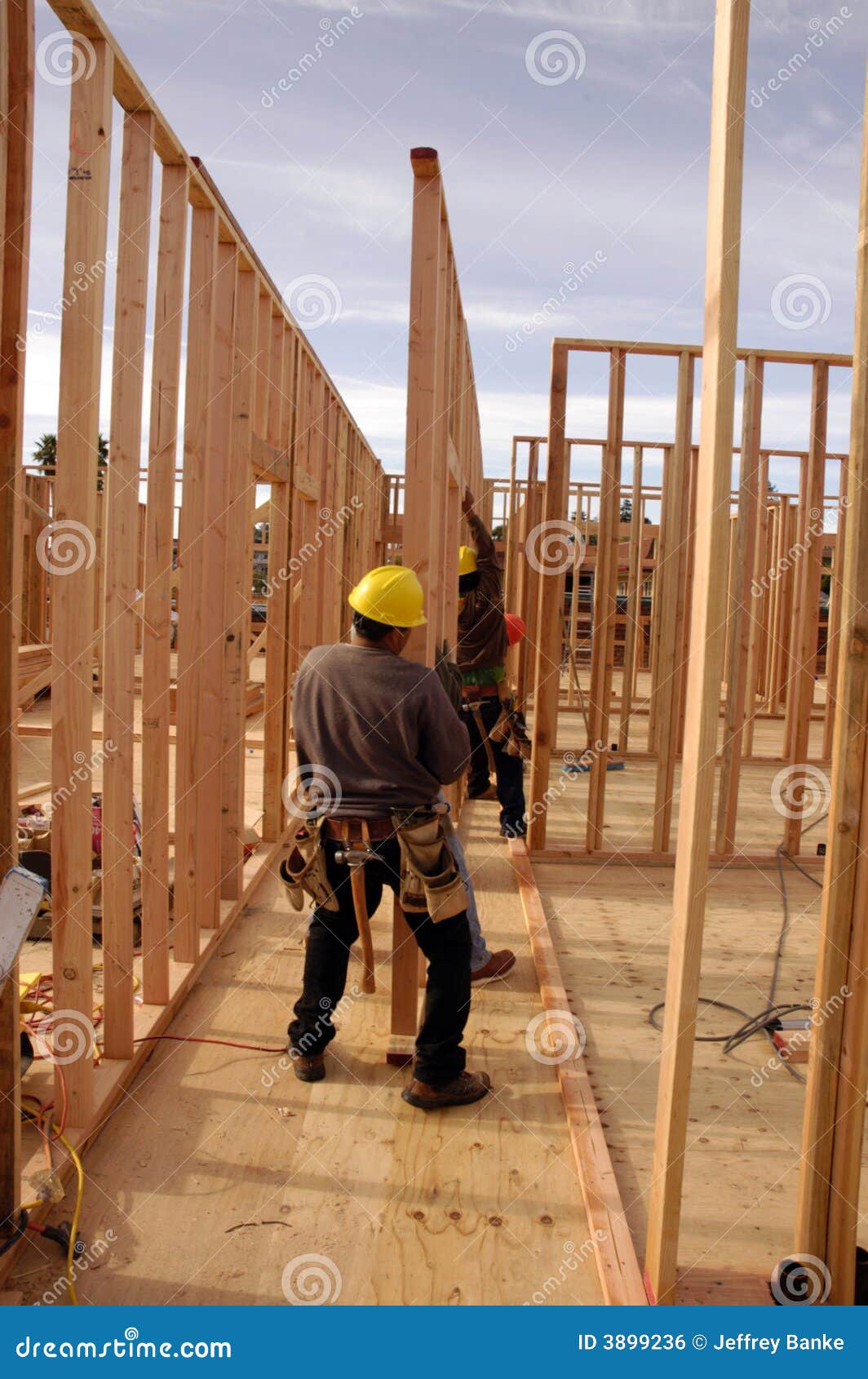 Hispanic Carpenters Setting a Wall Stock Photo - Image of bottom ...