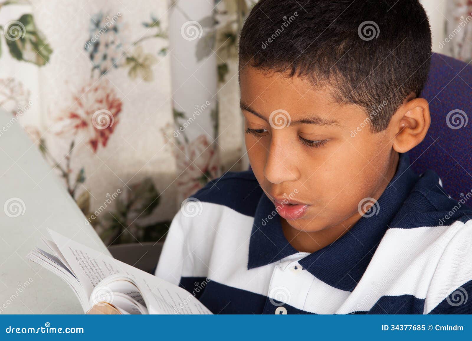 Hispanic Child Reading stock image. Image of young, book - 34377685