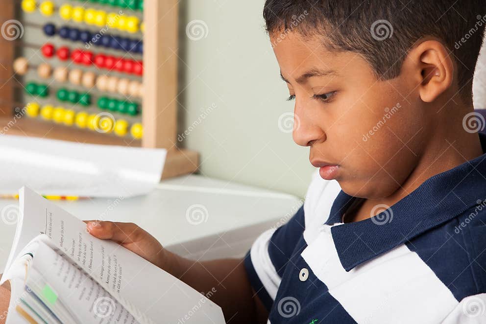 Hispanic Child Reading stock image. Image of desk, learning - 34377703