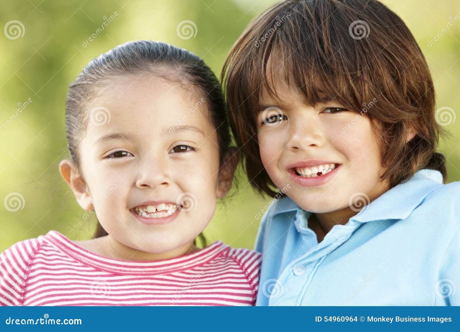 Hispanic Children Relaxing in Park Stock Photo - Image of horizontal ...