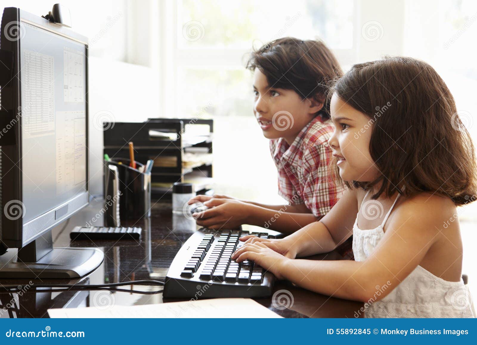 Hispanic Children Using Computer at Home Stock Image - Image of ...