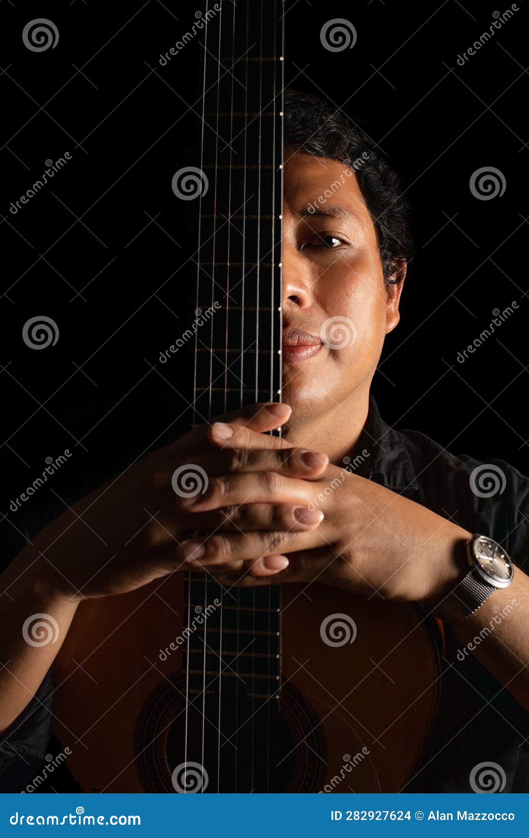 Hispanic Classical Guitarist Guitar Player on a Black Background, Studio Shot Portrait Stock ...
