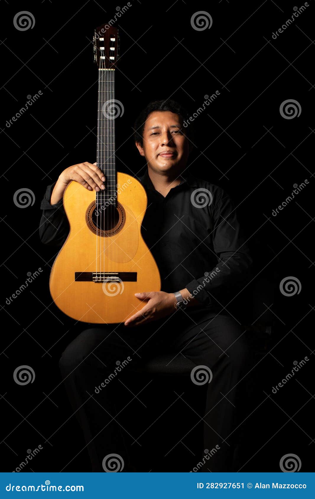 Hispanic Classical Guitarist Guitar Player on a Black Background, Studio Shot Portrait Stock ...