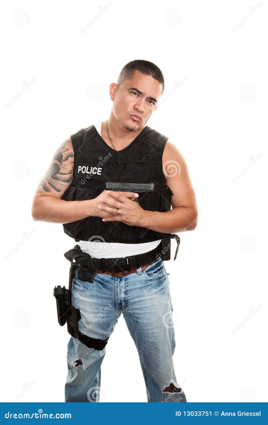 Hispanic Cop Holding Gun stock image. Image of jeans - 13033751