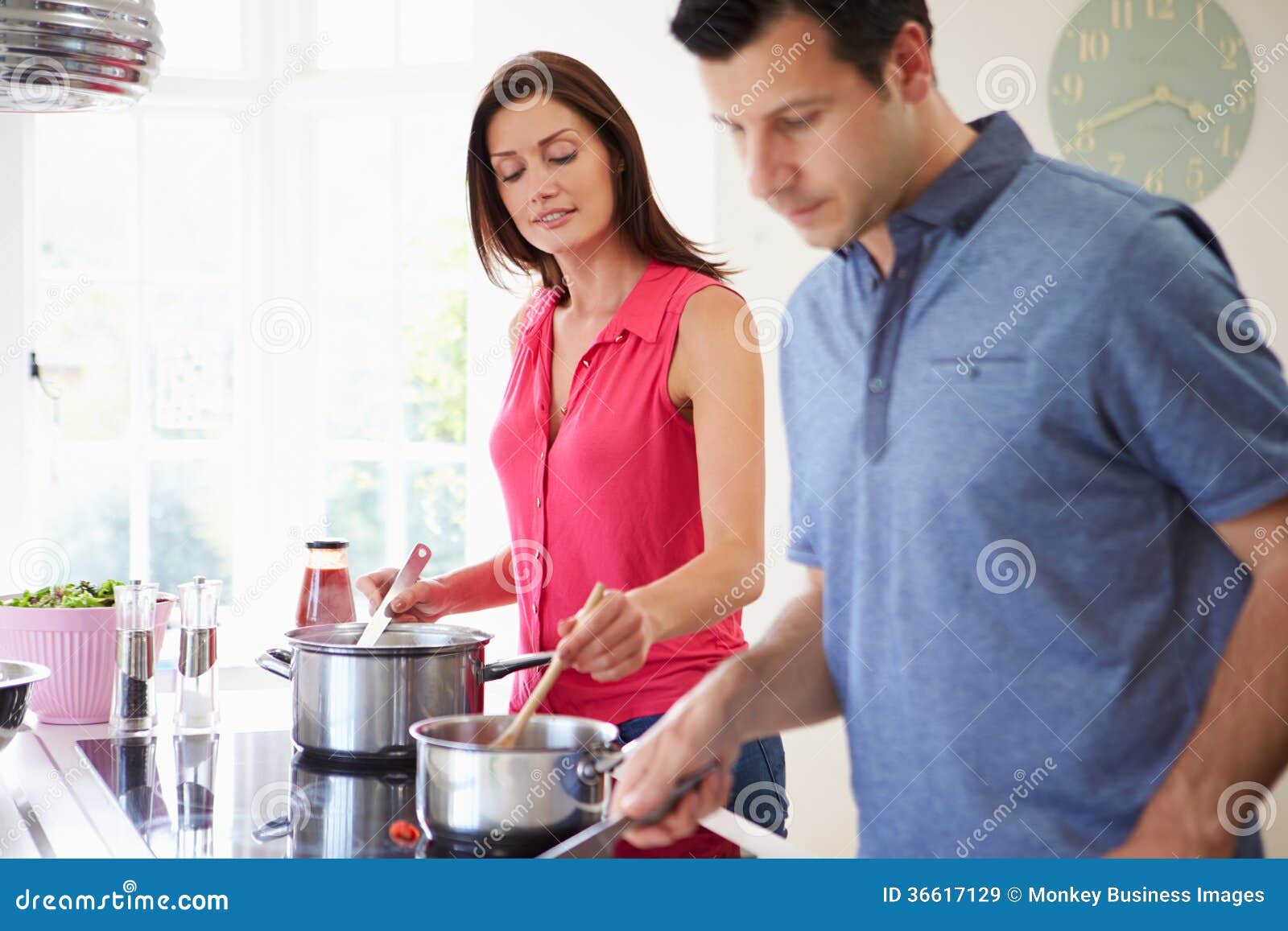 Hispanic Couple Cooking Meal at Home Stock Image - Image of people ...