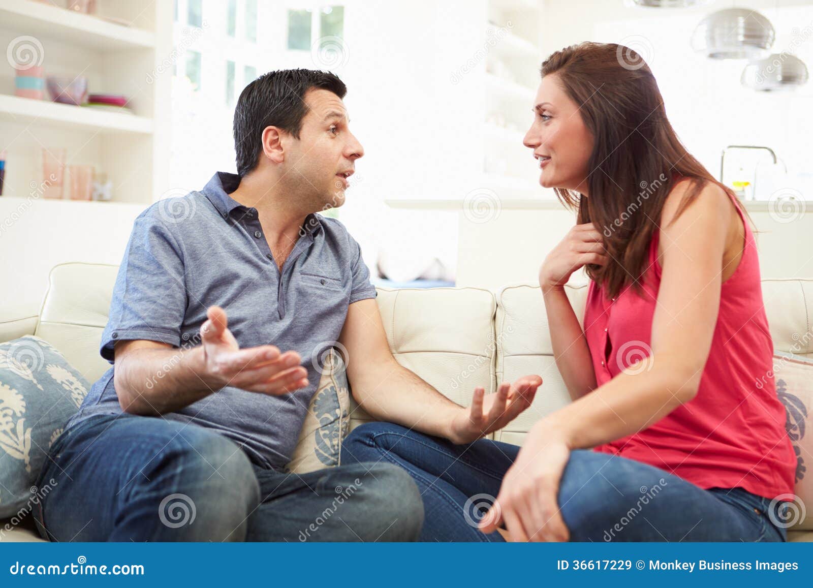 Hispanic Couple Sitting on Sofa Arguing Stock Image - Image of lounge ...