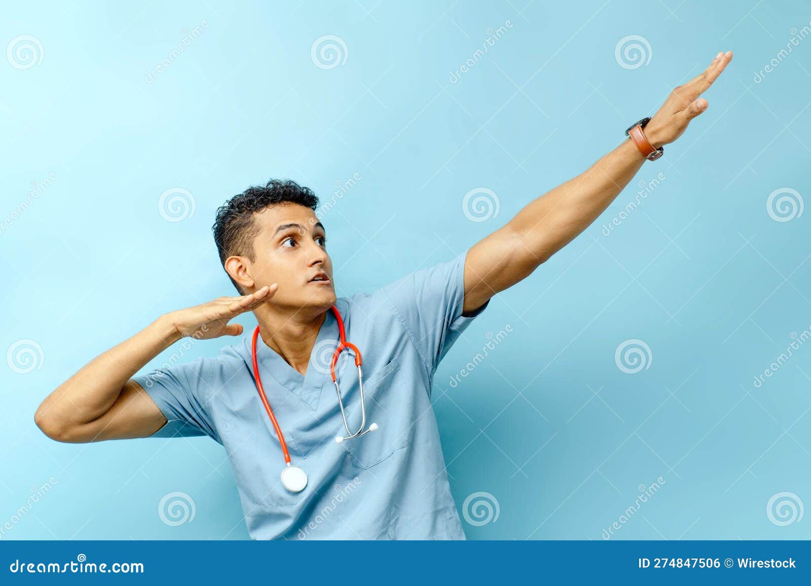 Hispanic Doctor in an Ambitious Pose on the Bright Blue Background ...