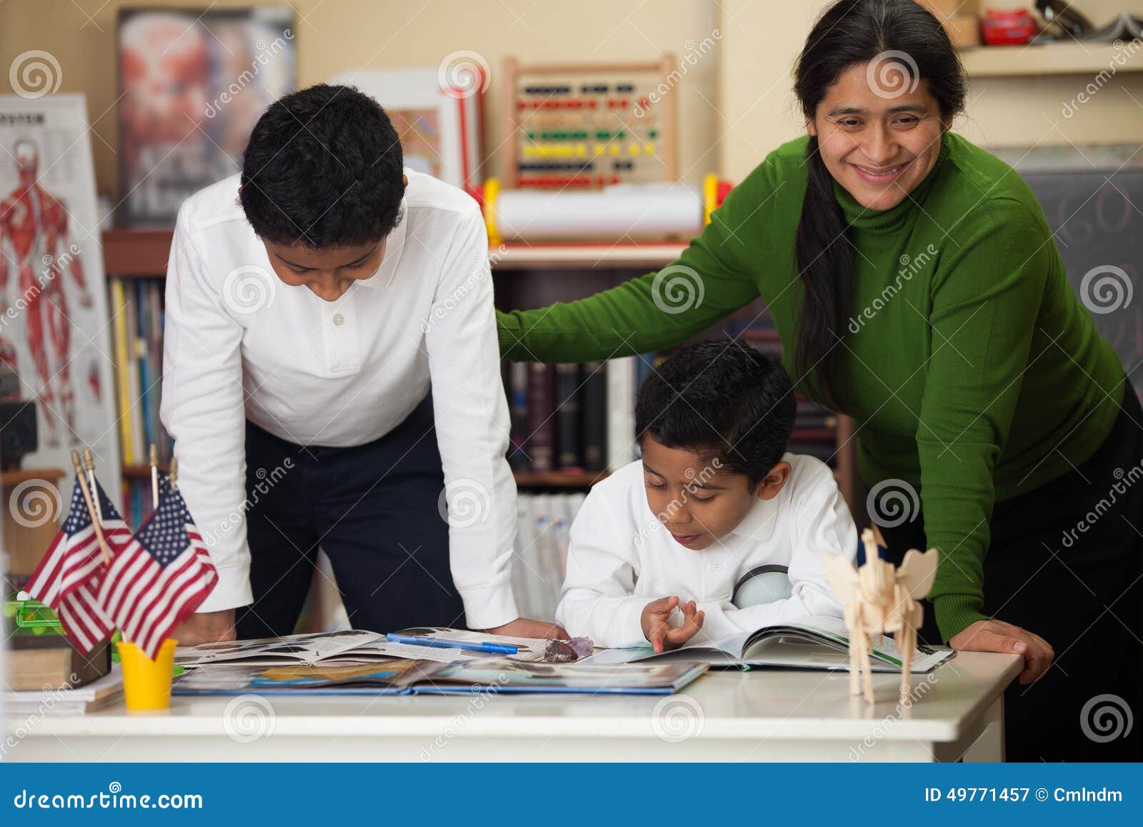 Hispanic Family in Home-school Setting Studying Rocks Stock Image ...