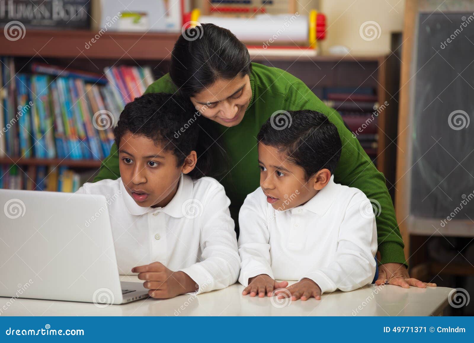 Hispanic Family with Laptop in Home-school Setting Stock Image - Image ...
