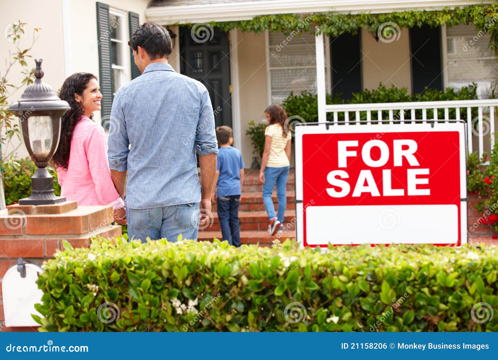 Hispanic Family Outside Home Stock Photo - Image of garden, hedges ...