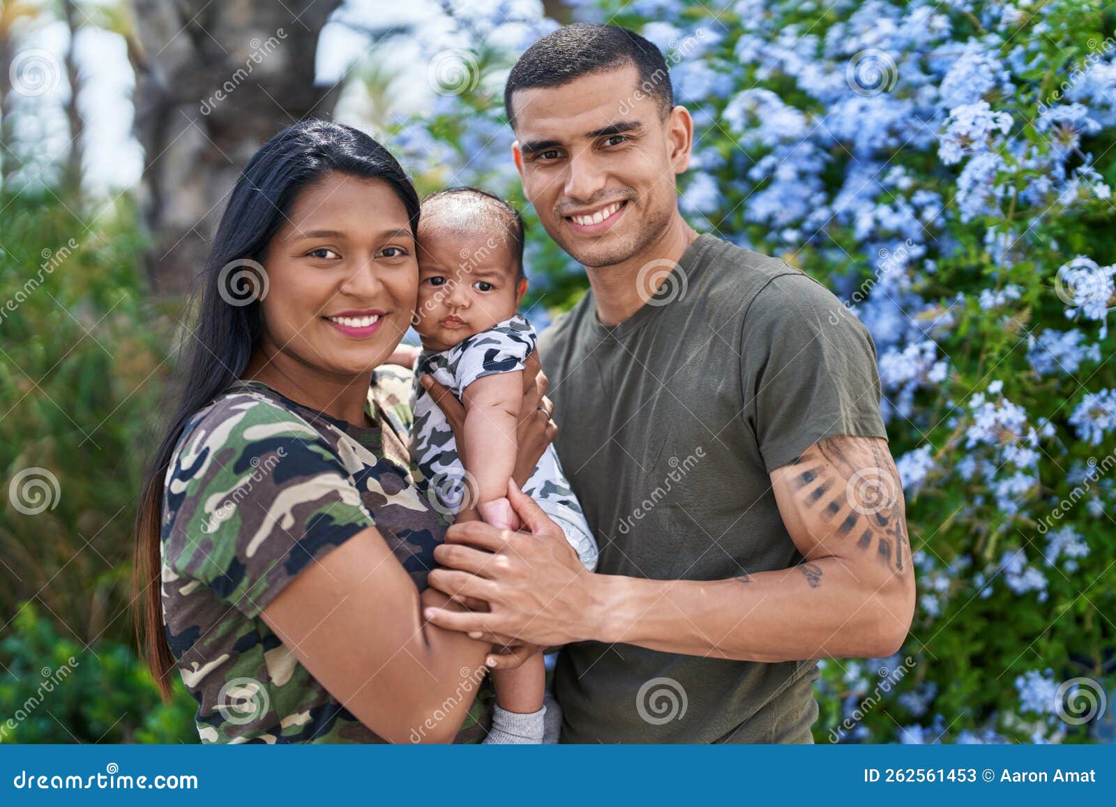Hispanic Family Smiling Confident Hugging Each Other at Park Stock ...