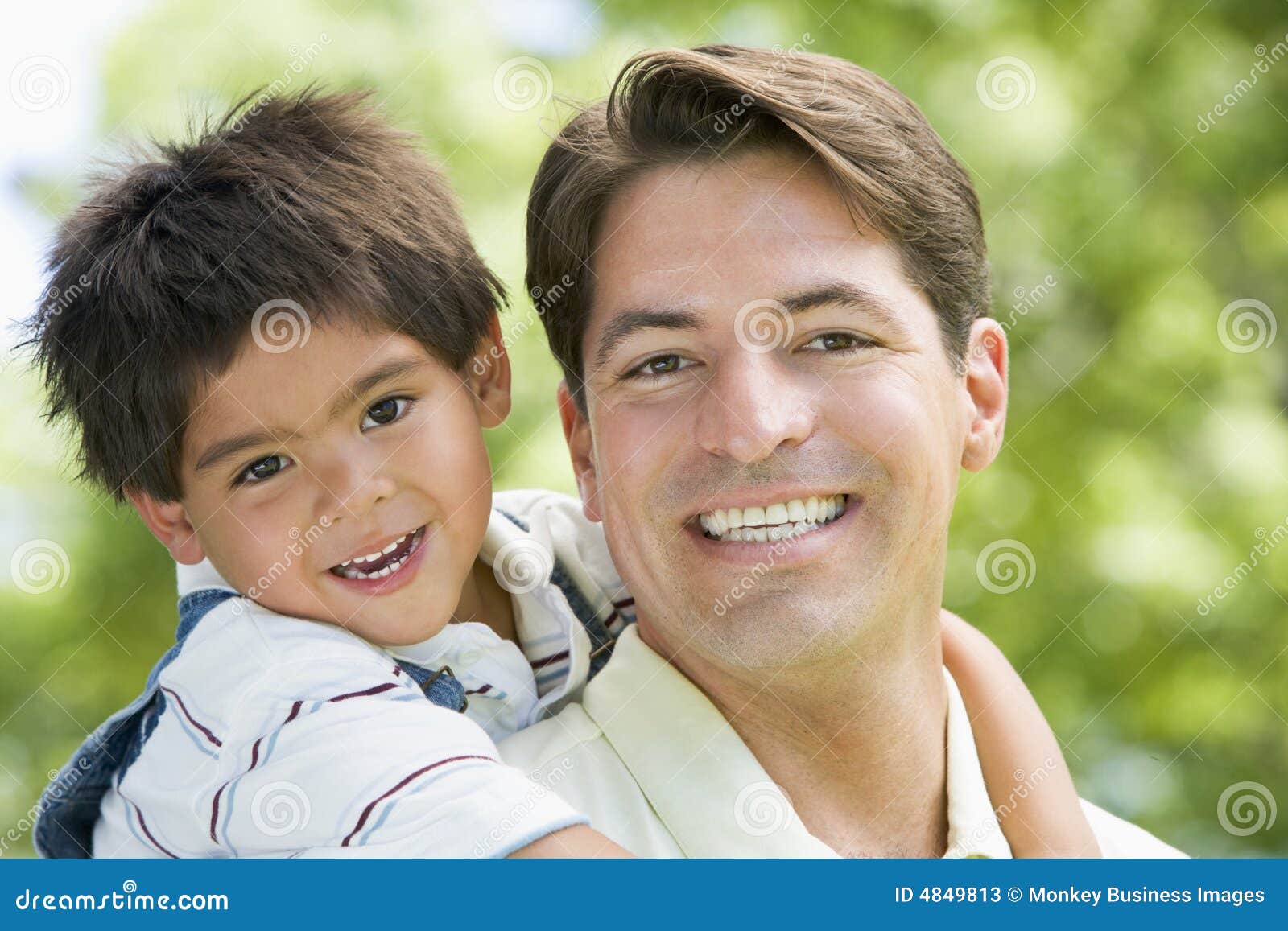 Hispanic Father Of Interracial Family Drinking A Cup Coffee Laughing ...